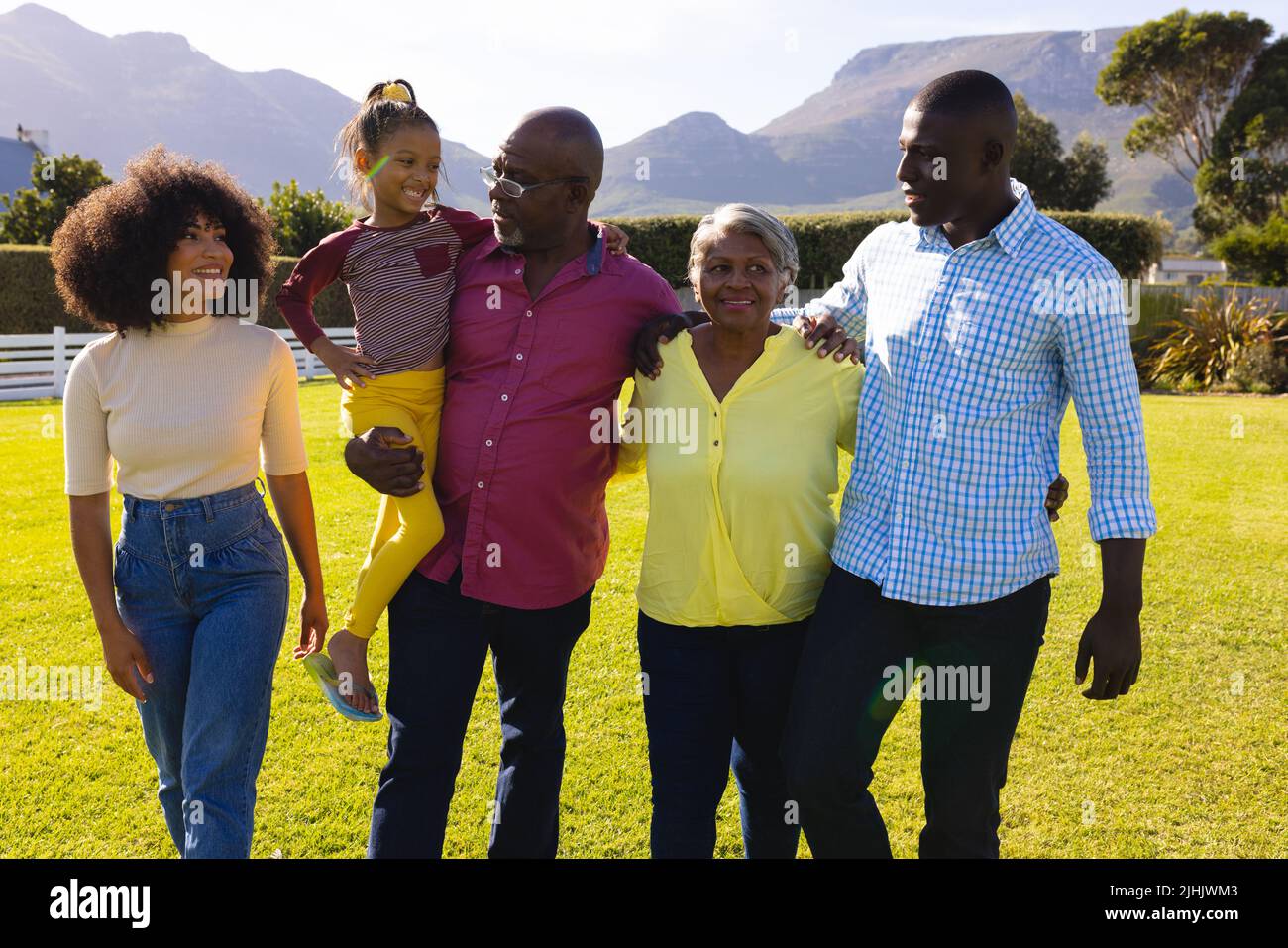 Happy multigeneration family outdoors in hi-res stock photography and ...