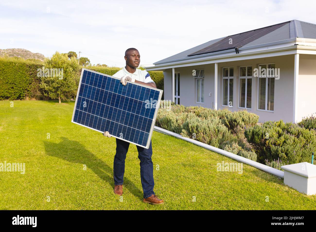 African people in field solar panel hi-res stock photography and images ...