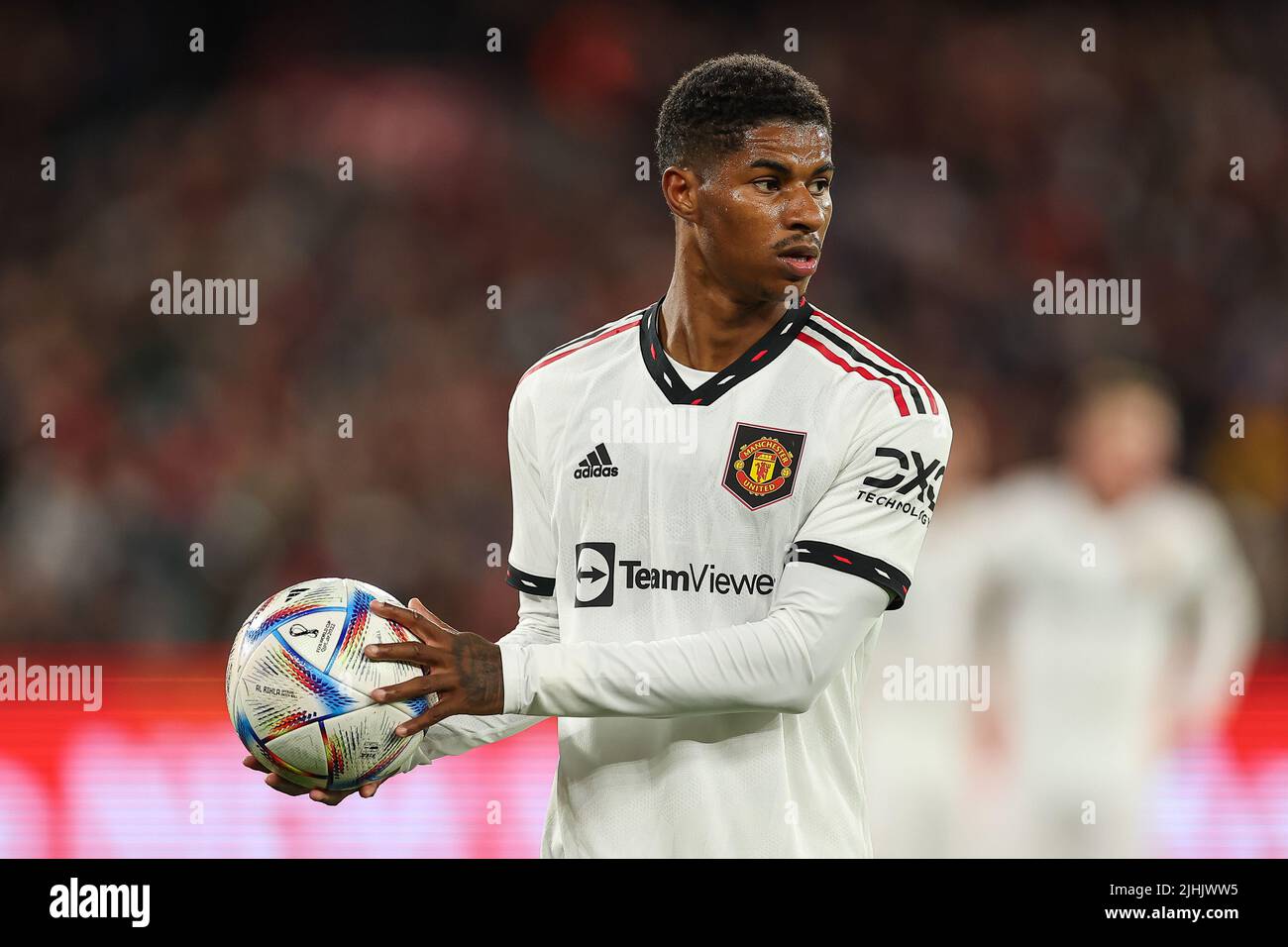 Marcus Rashford (10) of Manchester United holds the match ball Stock ...