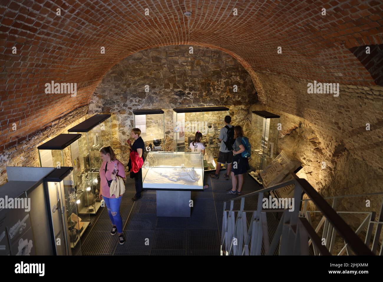 Exhibition of historic objects, down inside one of the buildings of ...