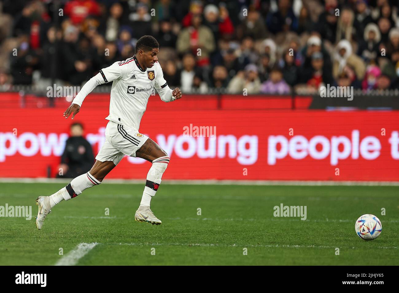 Marcus Rashford (10) of Manchester United makes a break with the ball ...
