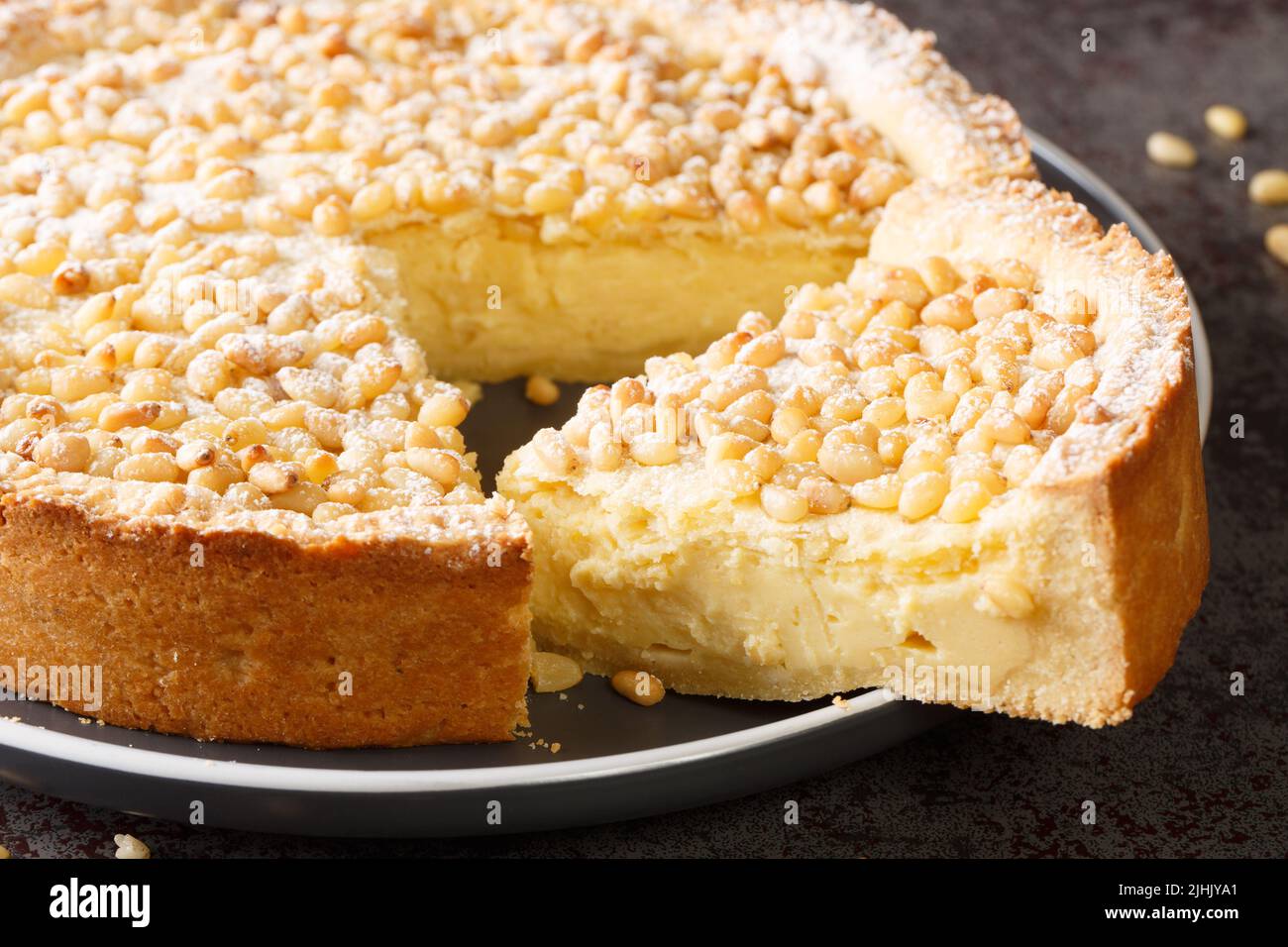 Authentic Italian Torta della Nonna Custard Filled Tart closeup in the ...