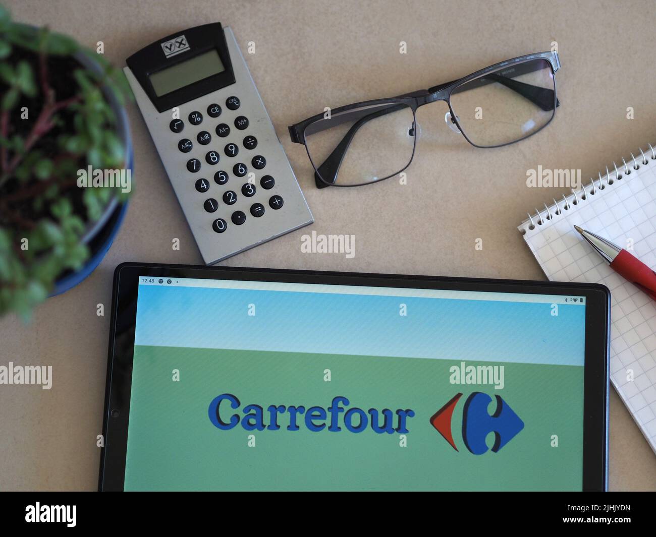 In this photo illustration, Carrefour SA logo seen displayed on a ...