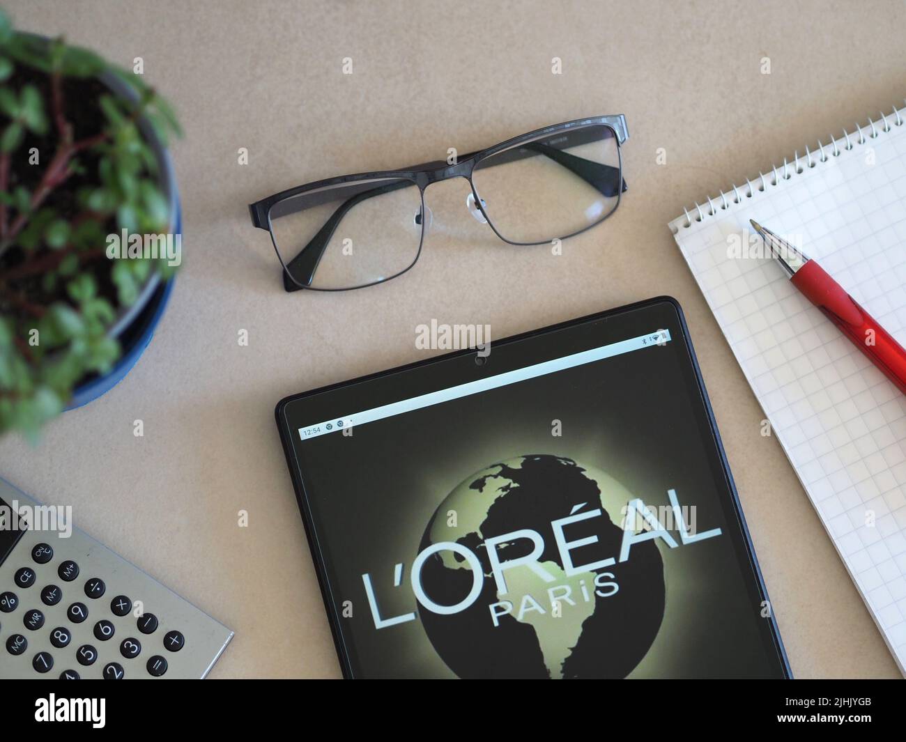 In this photo illustration, L´Oréal Paris logo seen displayed on a ...