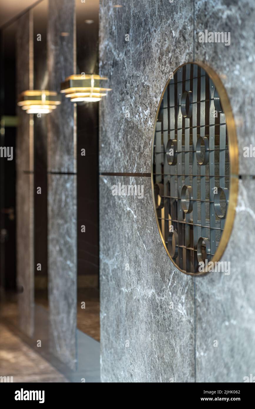 Modern interior of entrance in luxury residential building. Mirror on ...