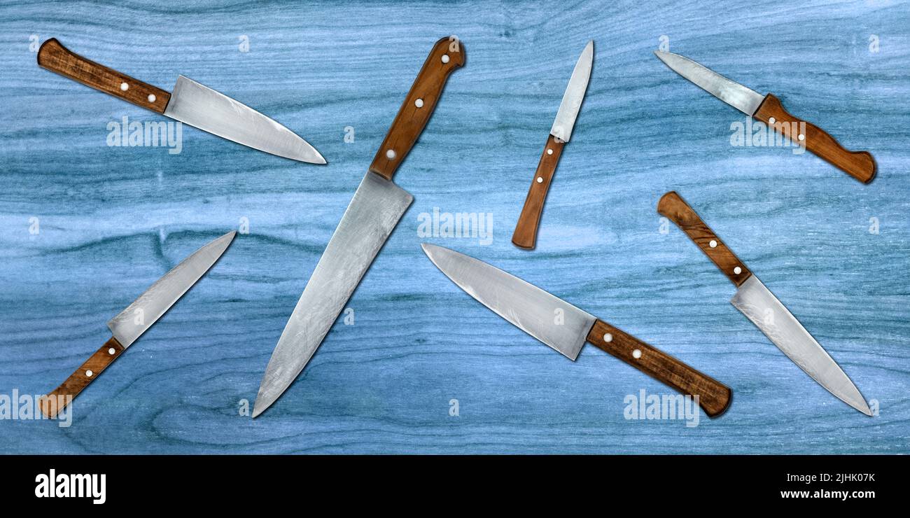 Topview of Set Cooking Knives on Blue Table Background Stock Photo - Alamy