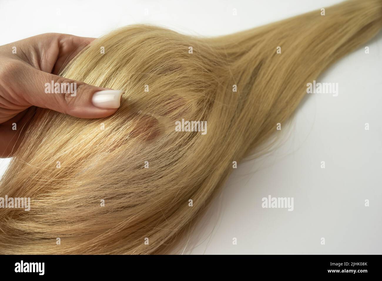 Hand holding shampoo hi-res stock photography and images - Alamy