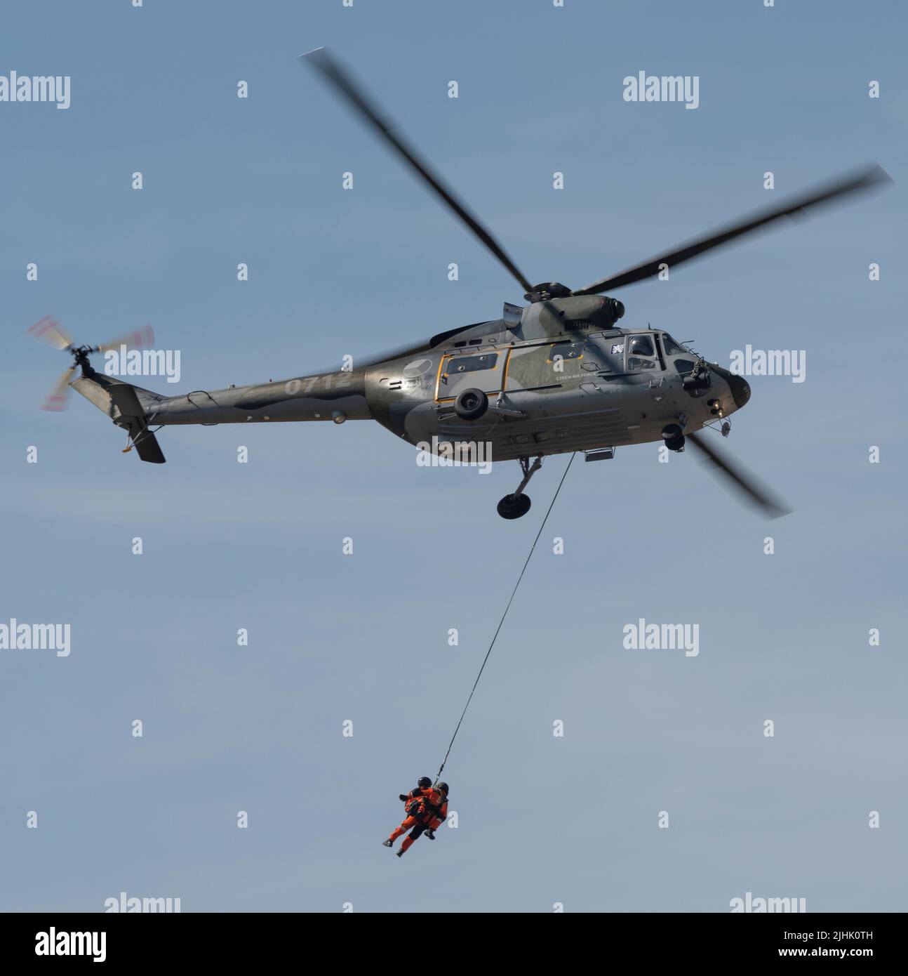 Two men on winch hi-res stock photography and images - Alamy