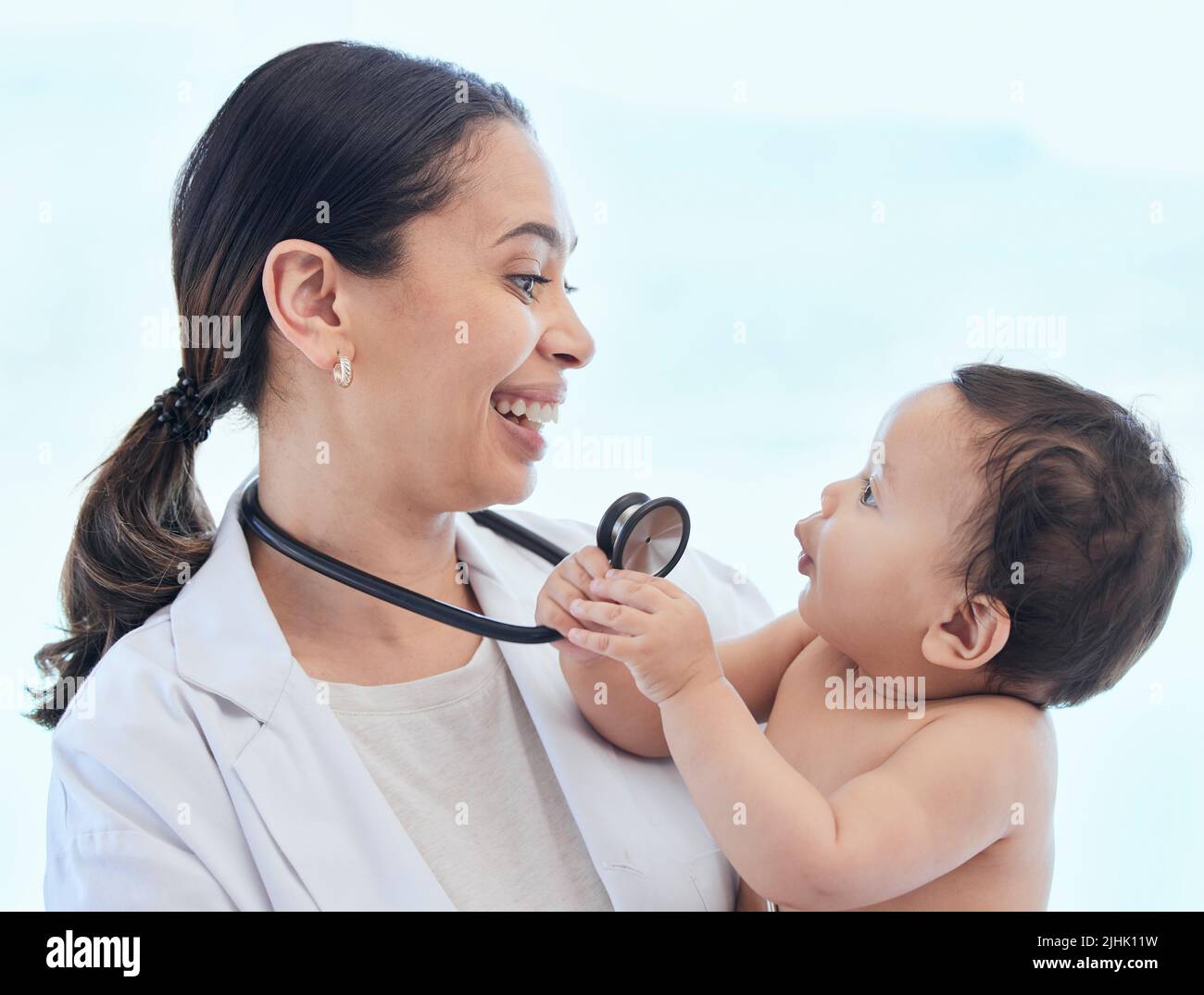 Ill show you how to do your job better. a paediatrician examining a ...