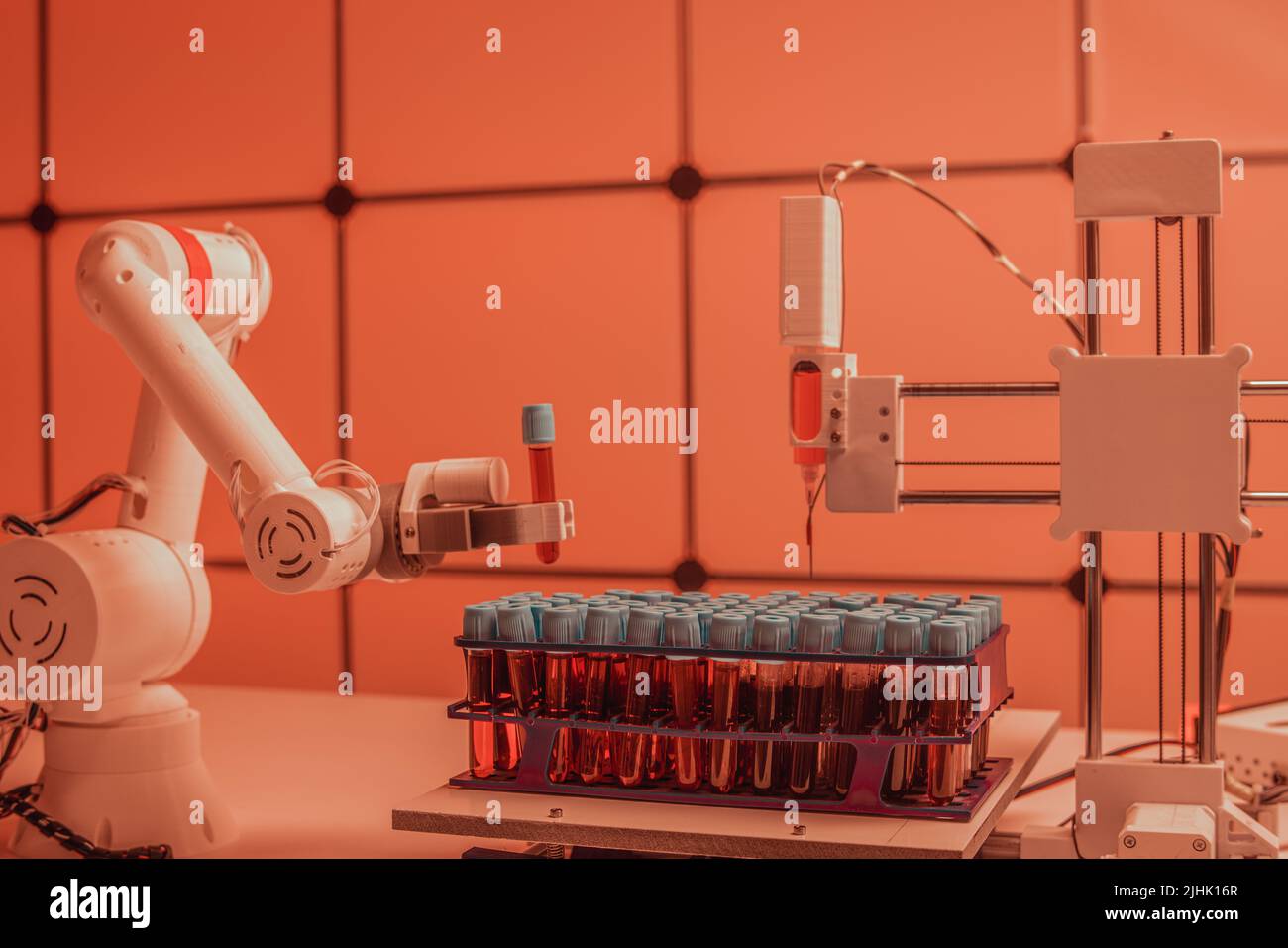 modern genetic laboratory PCR processor and robot with test tube in ...