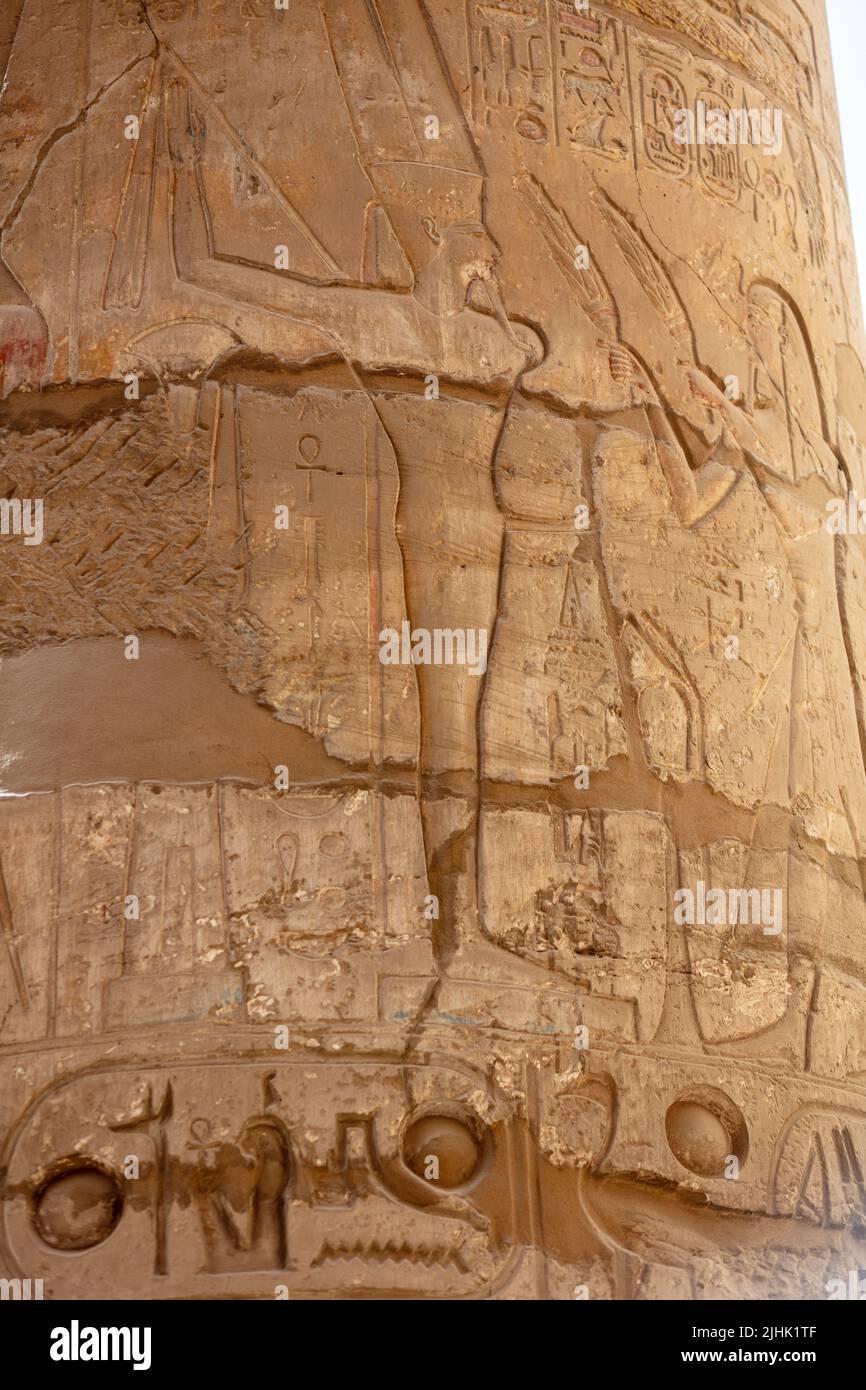 Different hieroglyphs on the walls and columns in the Karnak temple ...