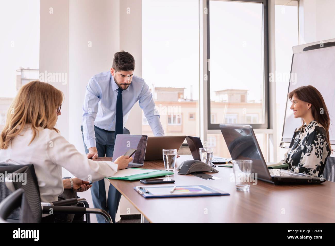 Business meeting at the office. Group of business people sitting around ...