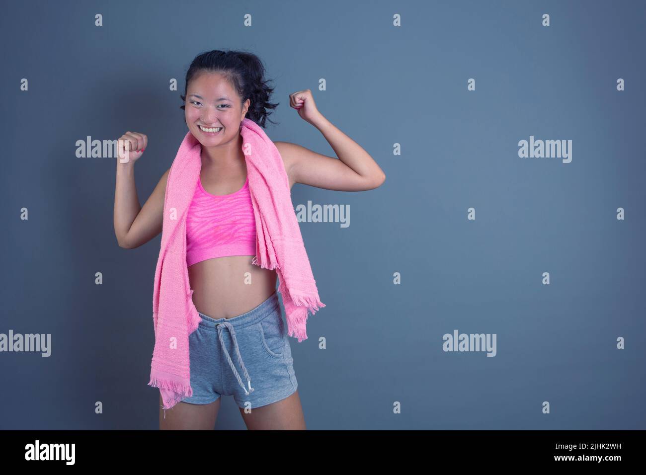 beautiful ethnic Chinese sportswoman with towel around her neck Stock ...