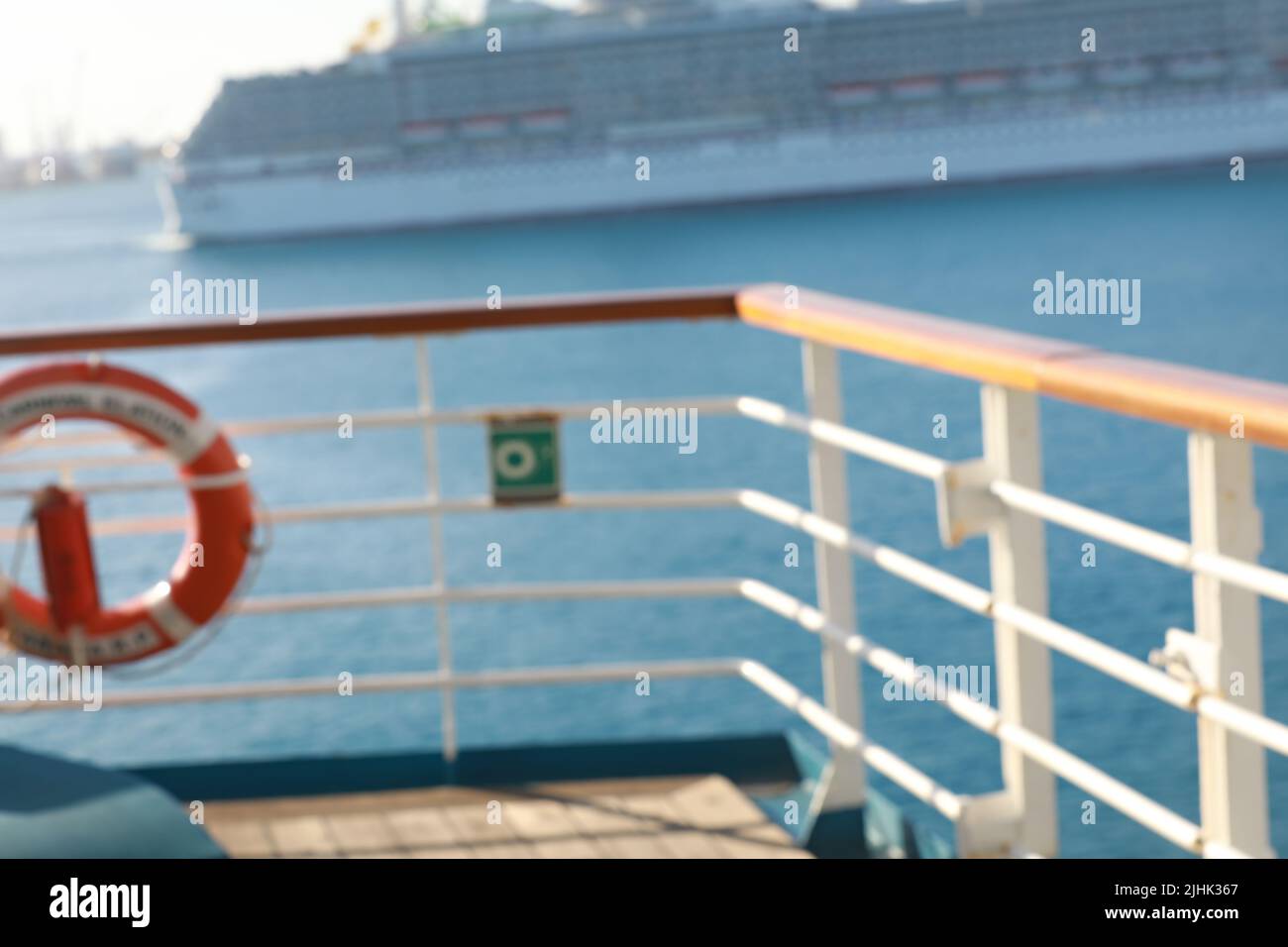 Railing of cruise ship with ocean view Stock Photo - Alamy