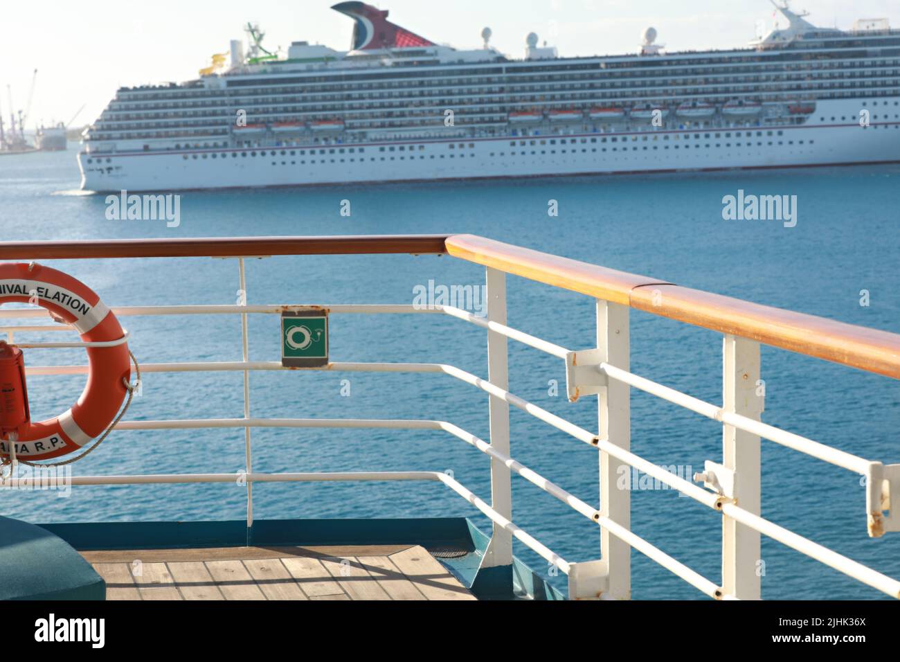 Railing of cruise ship with ocean view Stock Photo - Alamy