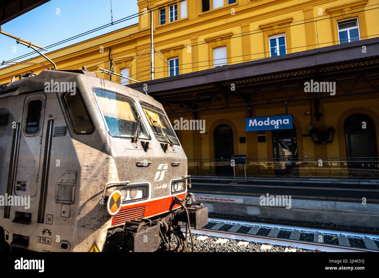 A train arriving to Modena Train Station during a summer day Stock ...