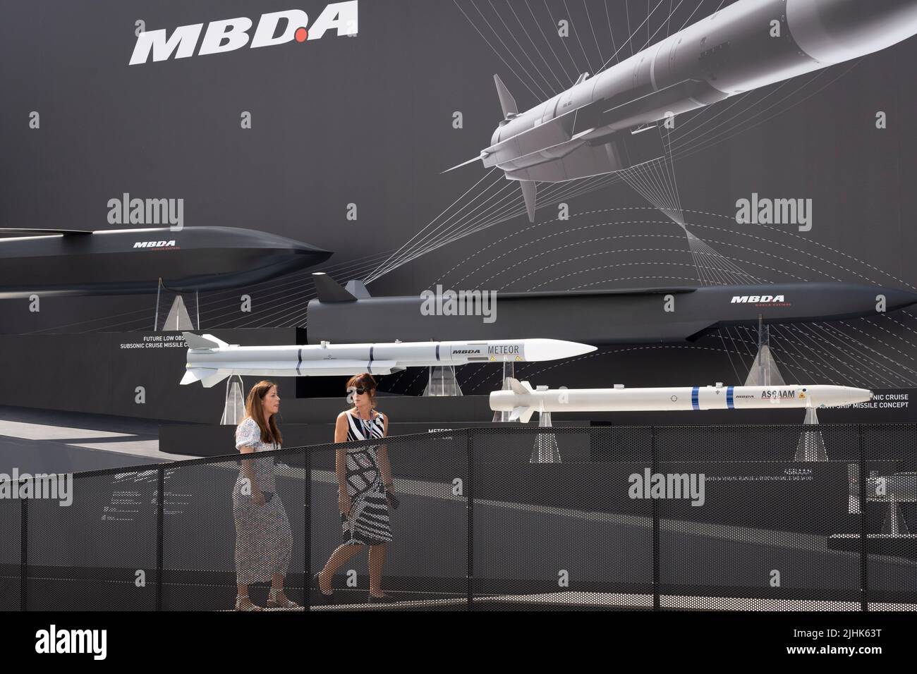 Aerospace visitors walk past missile exhibits by French Defence company ...