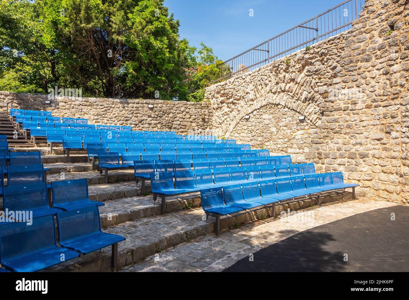 Blue chairs in the amphitheater. Stari Bar fortress in Montenegro ...