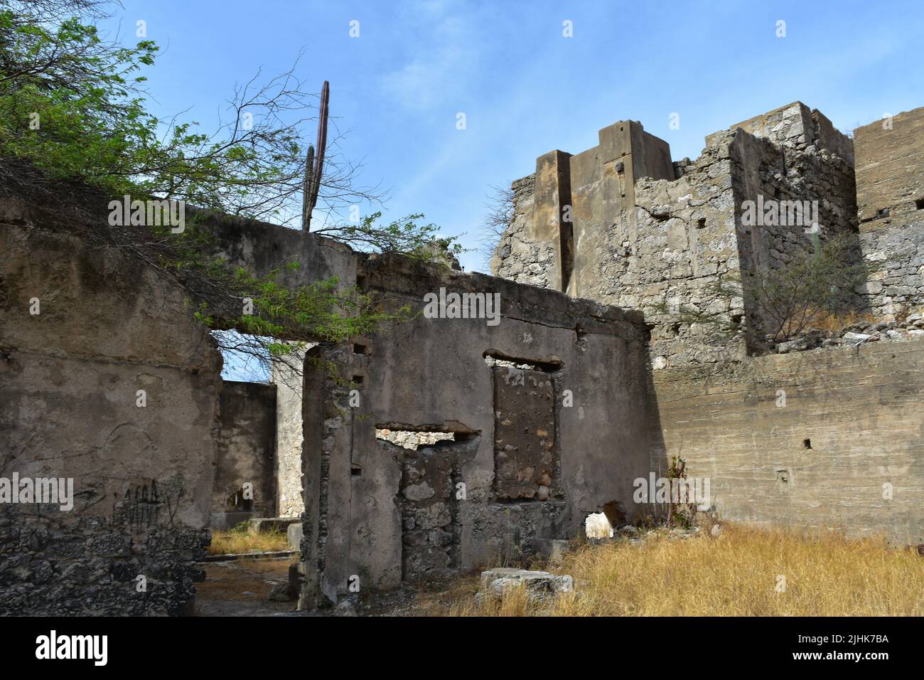 Deserted stone buildings of former gold mill in the desert in Aruba ...