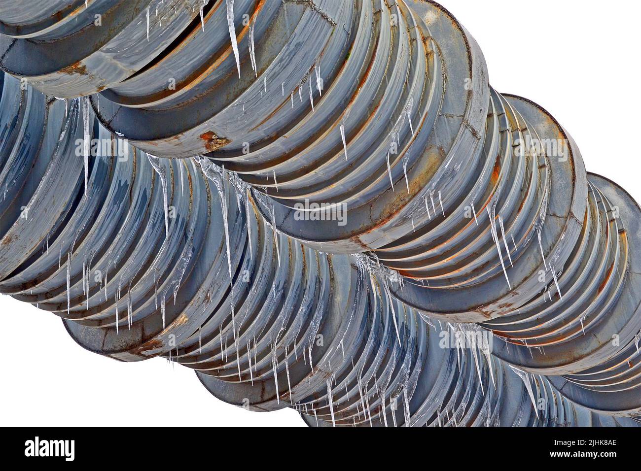 large metal welding pipe with icicles and many rings isolated on white ...