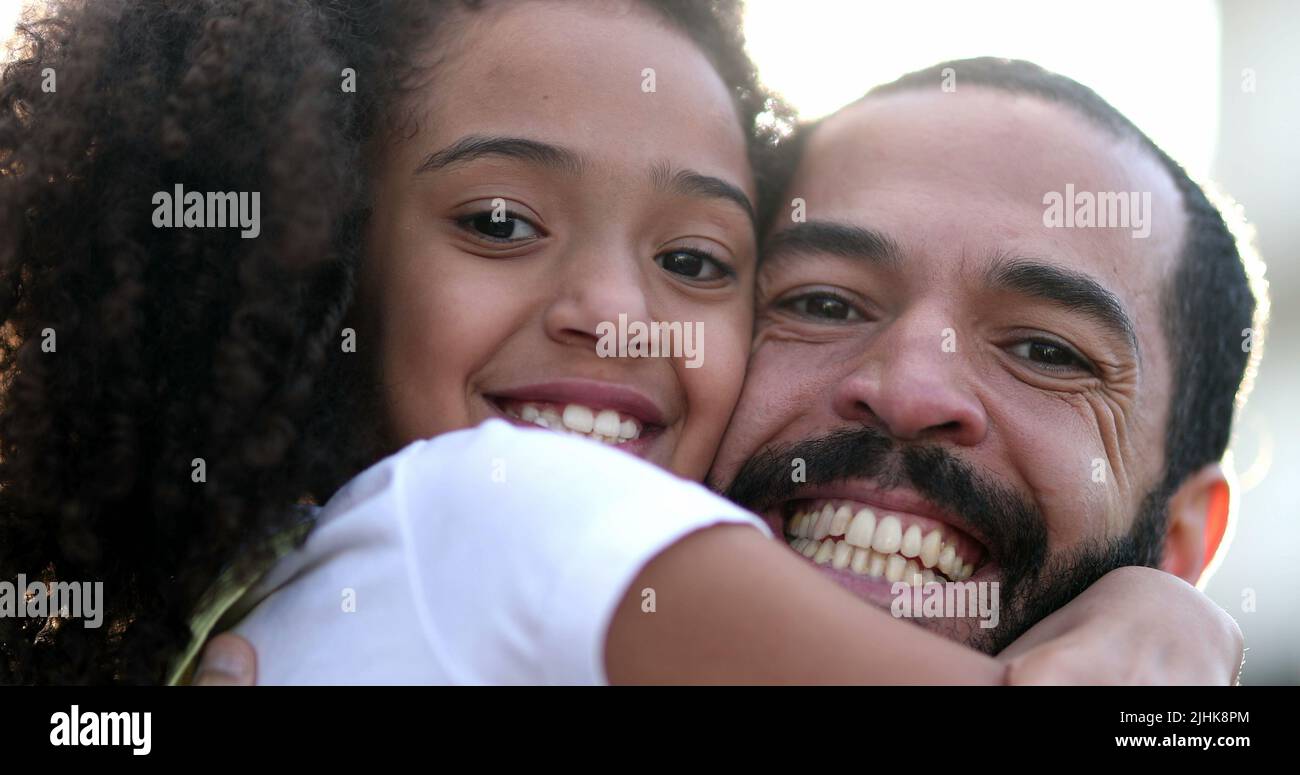 Father And Daughter Embrace Interracial Dad And Daughter Hugging Stock