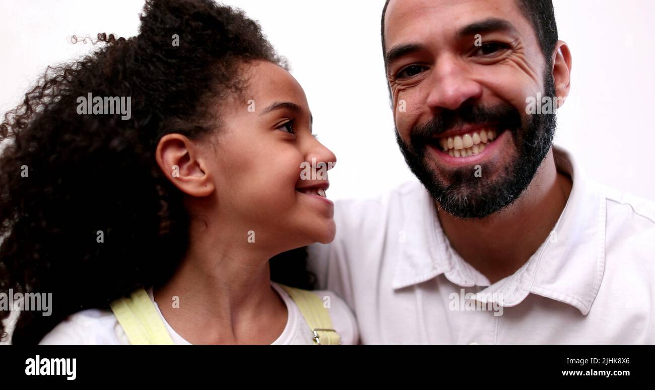 Father and daughter smiling at camera. real casual people. Child and ...