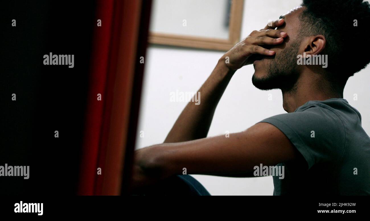Frustrated black man feeling anxiety. Anxious Candid African person in ...