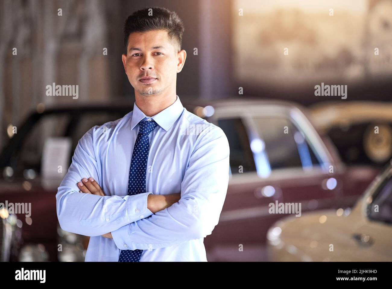 Im confident weve got just the car for you. Cropped portrait of a ...