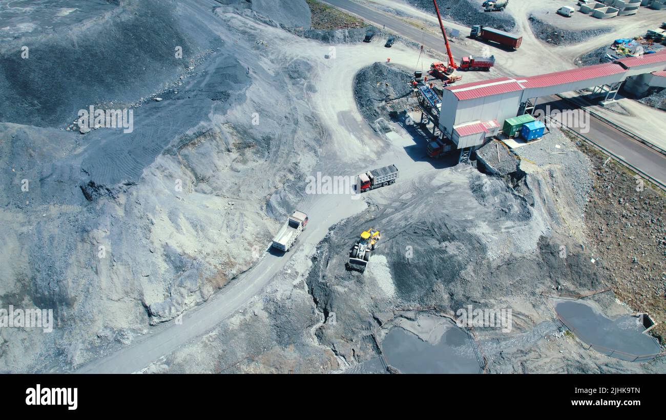 Trucks And Engineers Working On A New Construction. Changing Natural ...