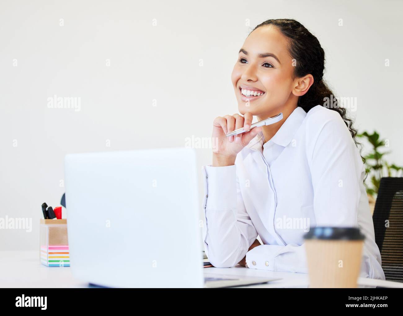 Successful young woman sitting laptop hi-res stock photography and ...
