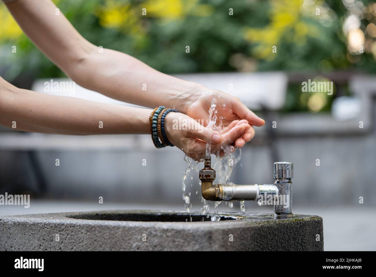 Hydration and aqua balance regulation for health. Hands with water ...