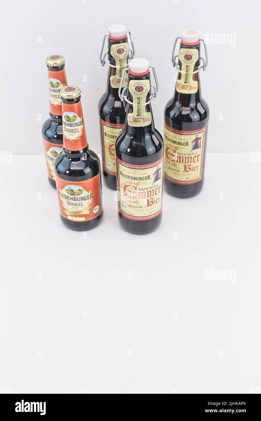 high quality organic farming cereals beer in a bottle on a white table ...