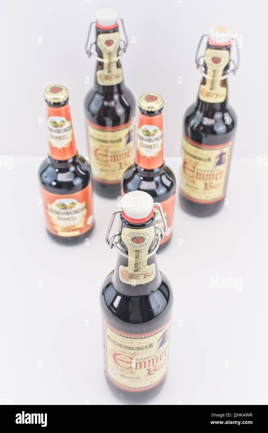high quality organic farming cereals beer in a bottle on a white table ...