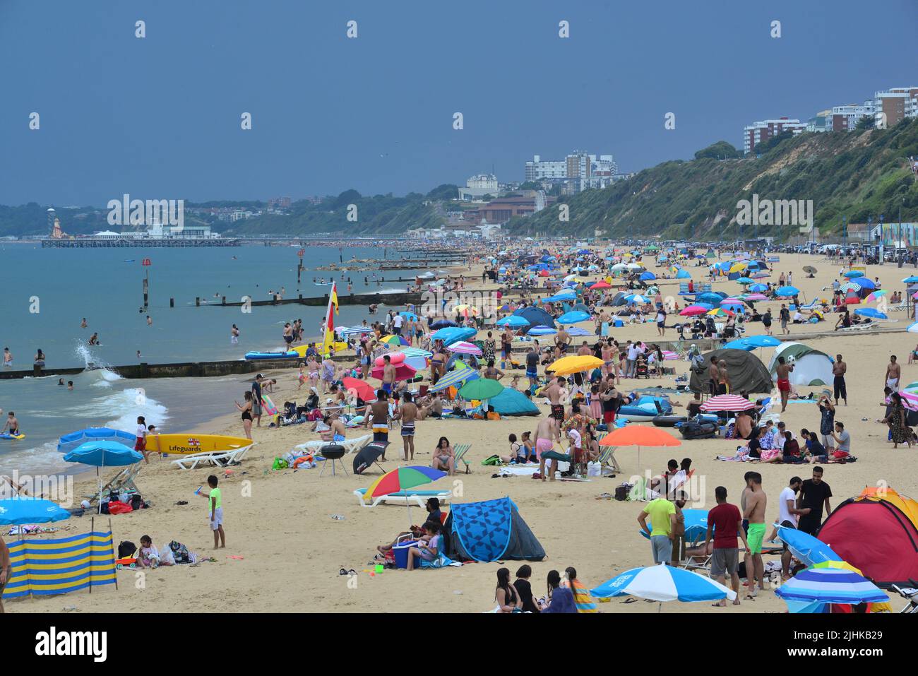 Dark clouds building over beach during heatwave, Boscombe and ...