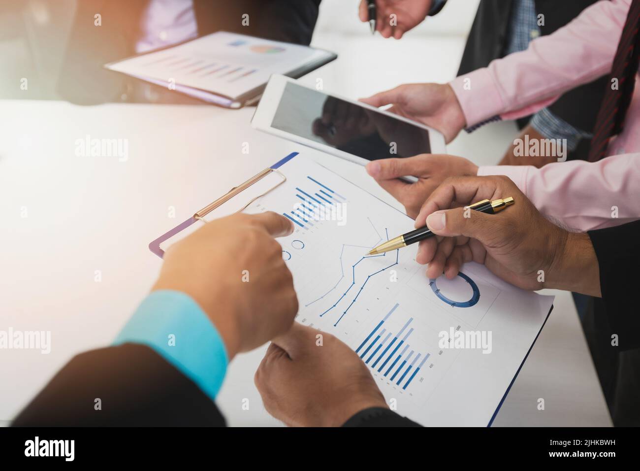 Businessmen discussing together in meeting room. Business team meeting ...