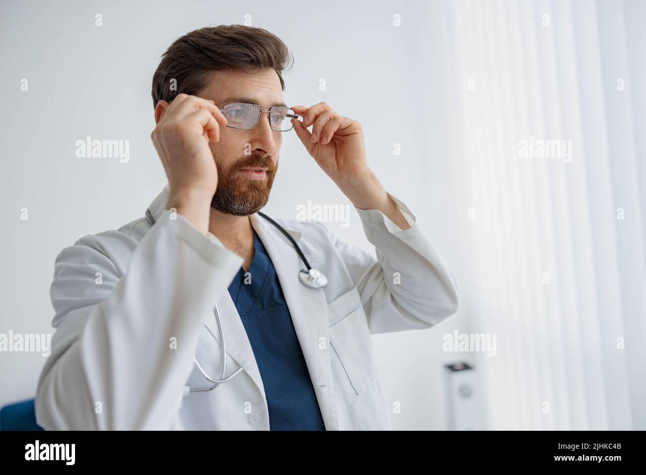 Cheerful female doctor glasses male hi-res stock photography and images ...