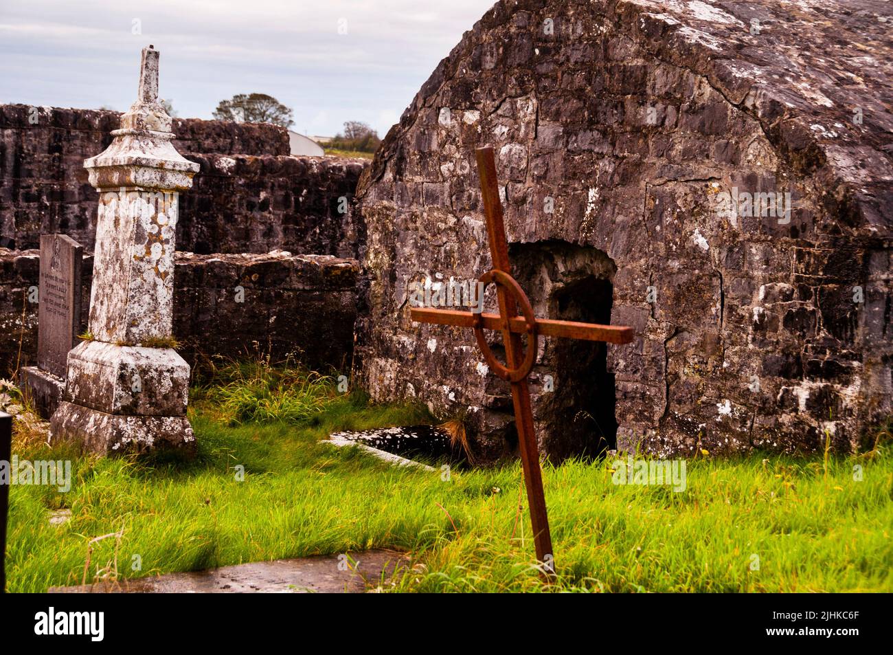 Barrel arch crypt and iron Celtic cross at the Carmelite Abbey of ...