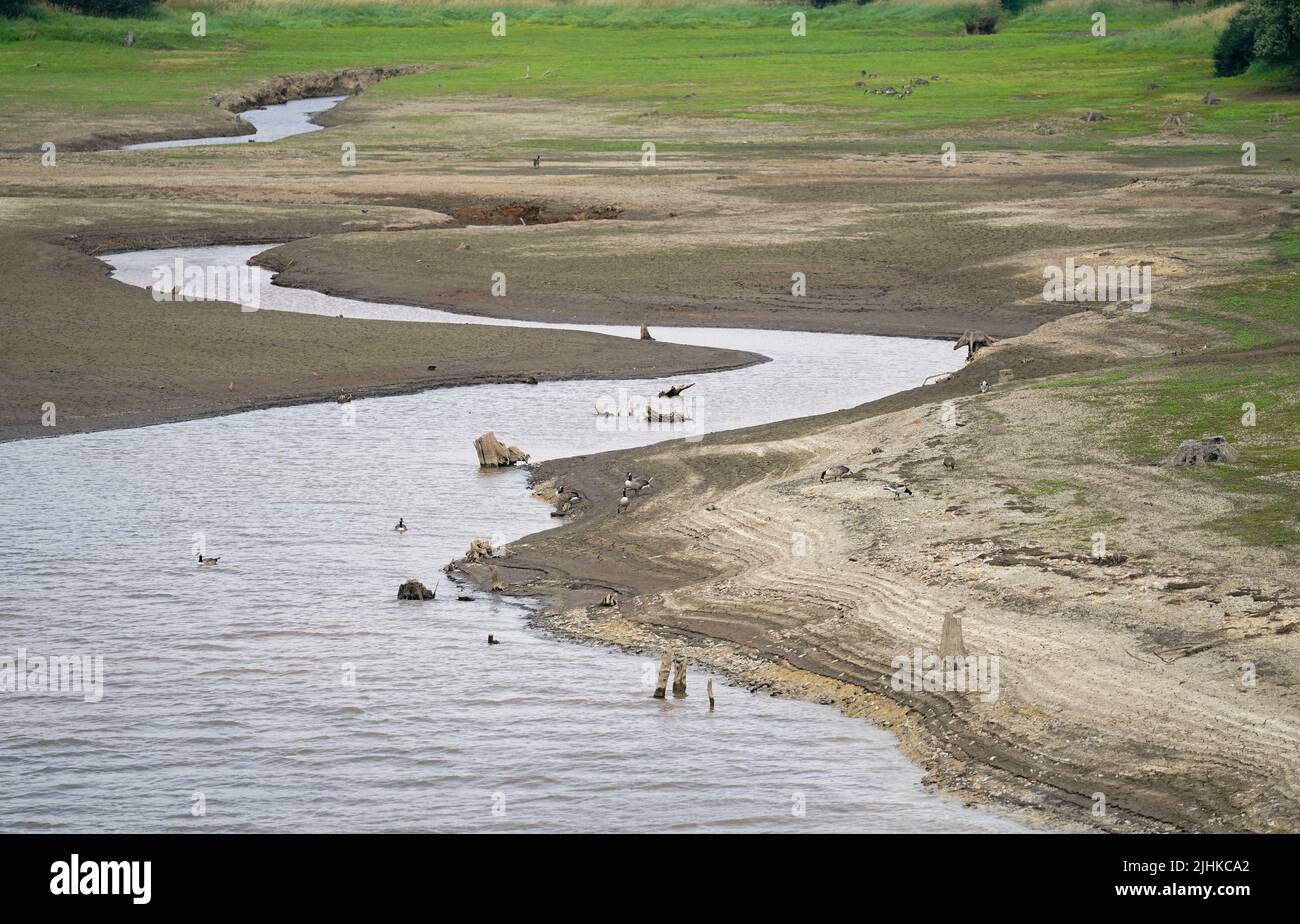 A view of low water levels at Roadford Lake in Devon. Temperatures have ...