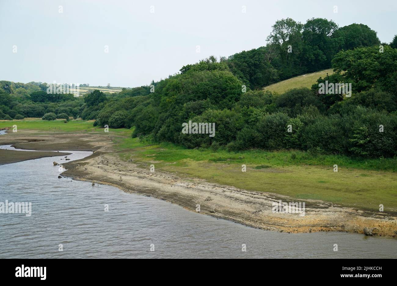 A view of low water levels at Roadford Lake in Devon. Temperatures have ...