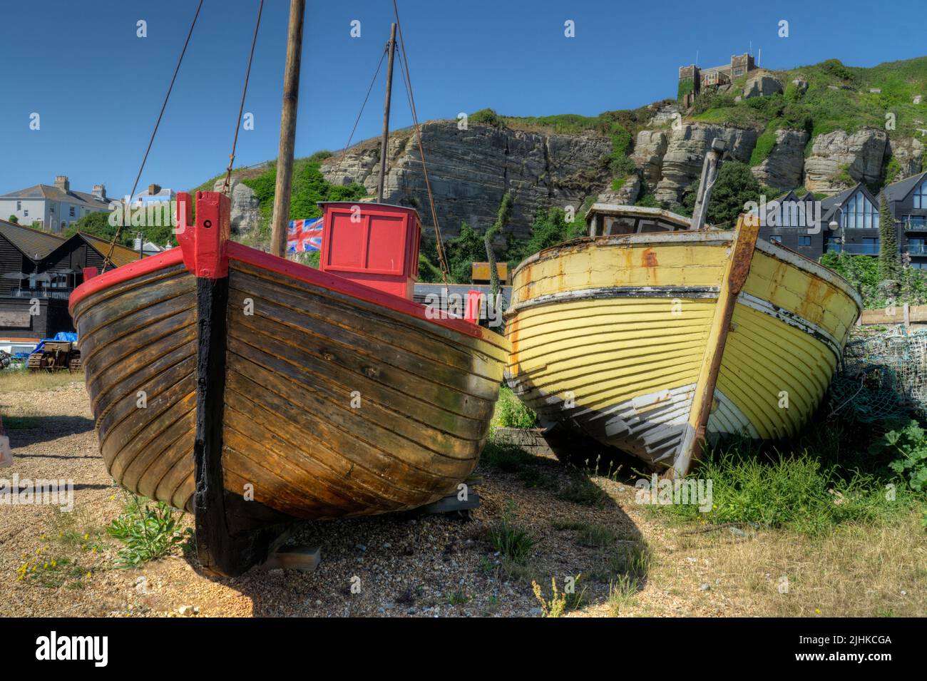 Two wooden trawlers hastings beach funicular Stock Photo - Alamy