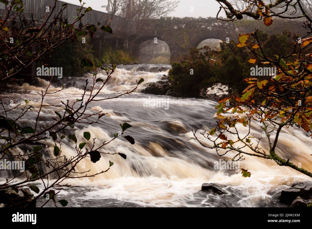 Owenglin River and stone arched Ardbear Bridge in the Connemara ...