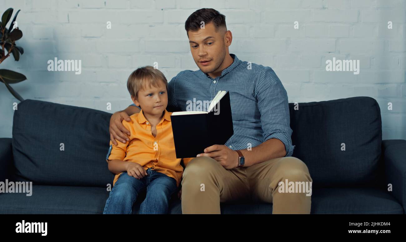Reading aloud in home hi-res stock photography and images - Alamy