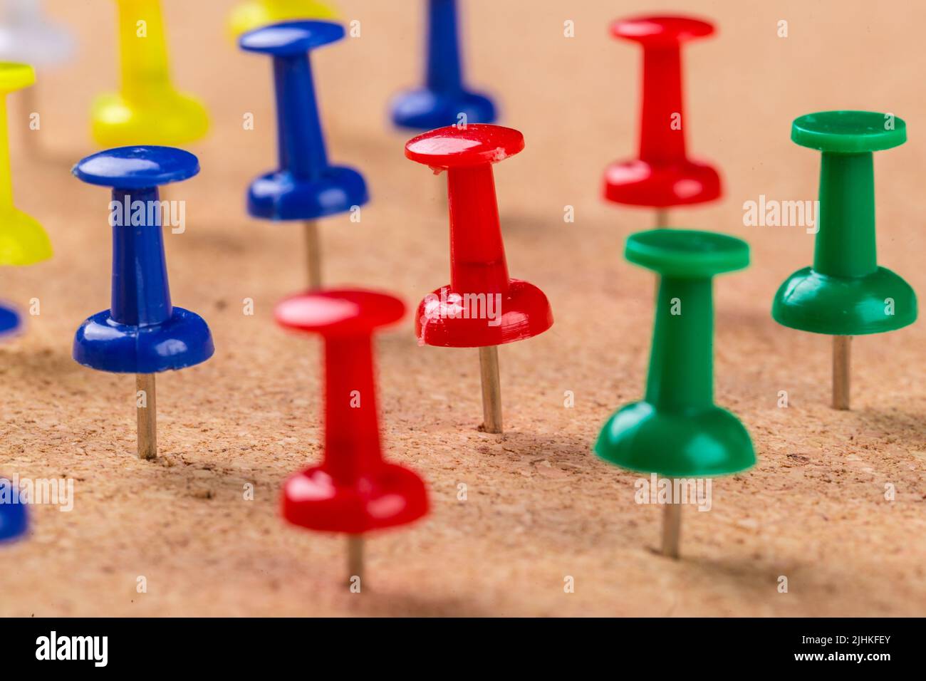 Pin board texture for background and colorful pins Stock Photo - Alamy
