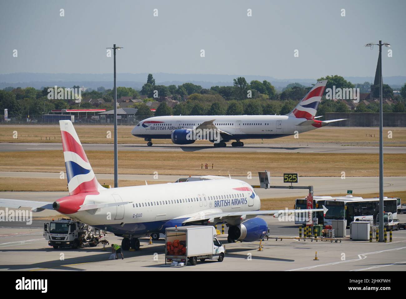 British Airways taxi in the heat at Heathrow Airport, London, where the ...