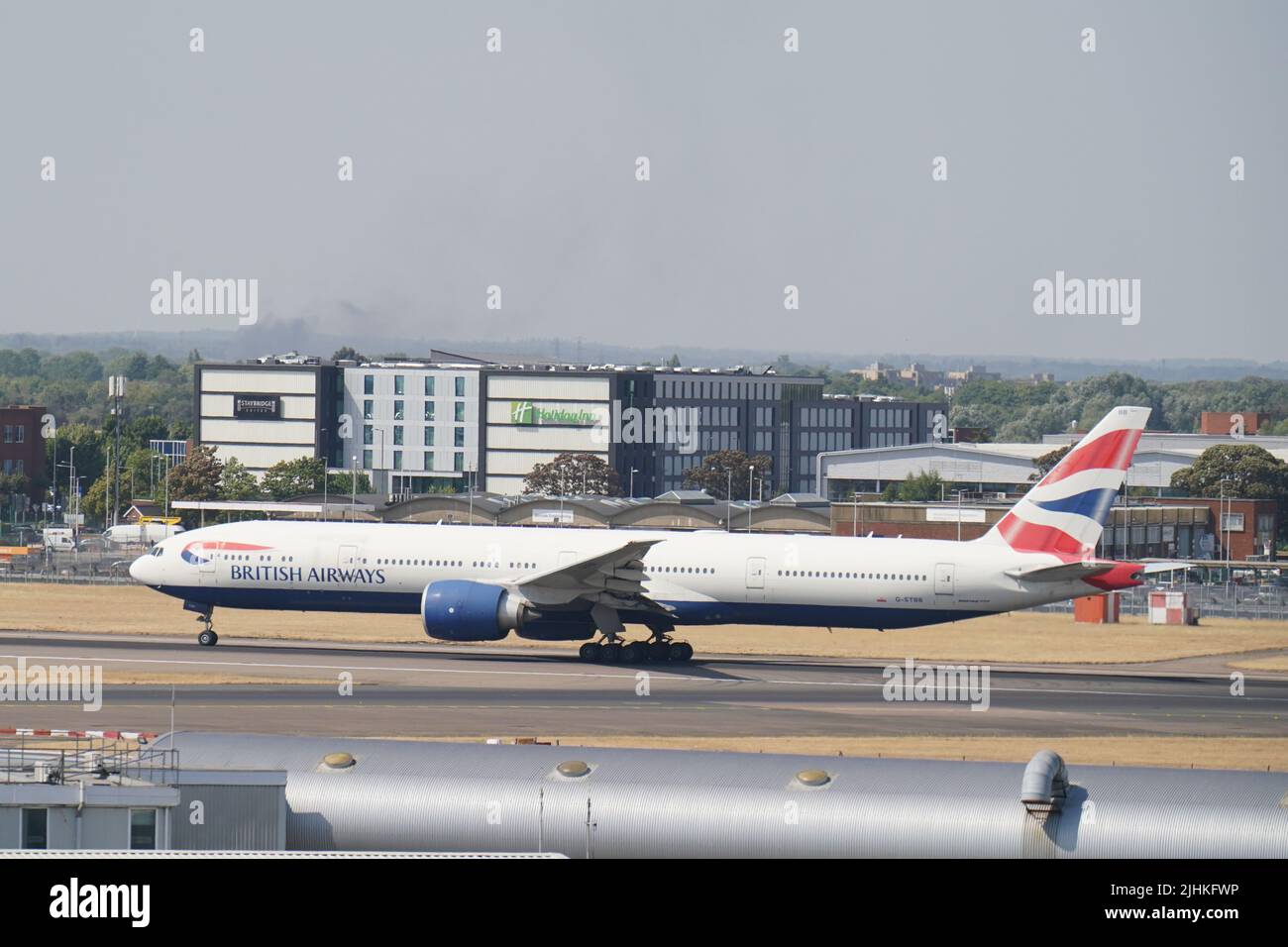 A British Airways flight takes off at Heathrow Airport, London, where ...