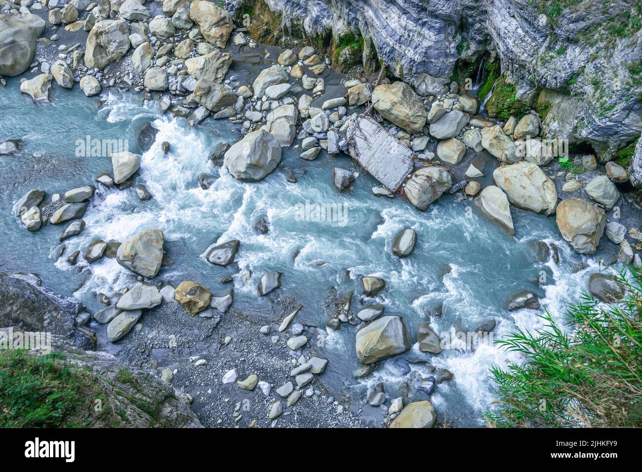 Beautiful scenic of rock cliffs with the river water flowing through ...