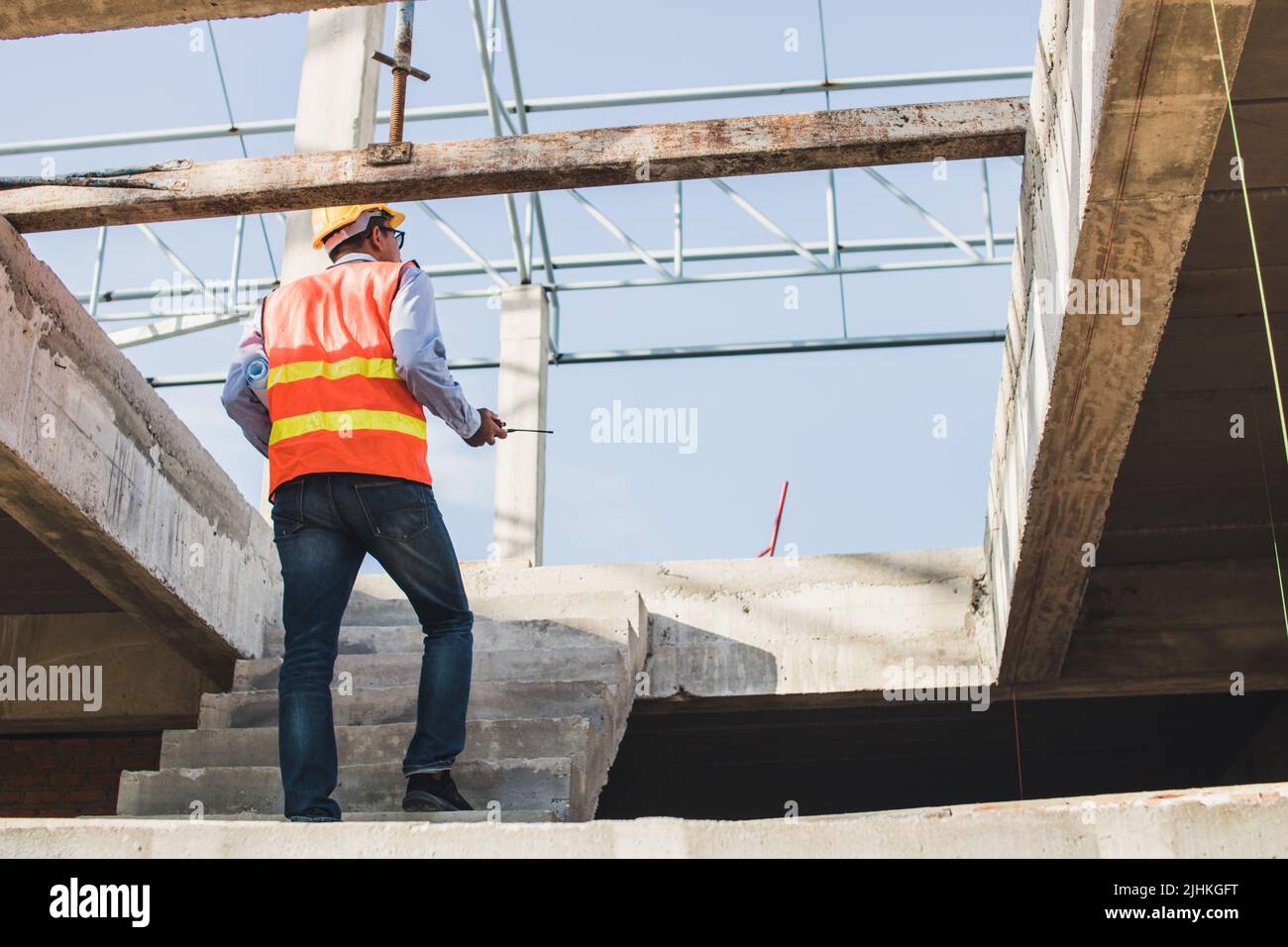 Inspector inspect and check in building construction Stock Photo - Alamy