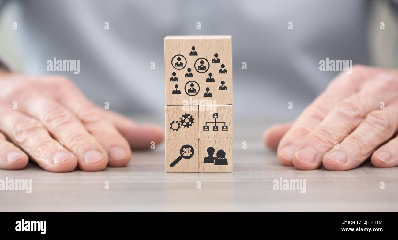 Wooden blocks with symbol of hrm concept Stock Photo - Alamy