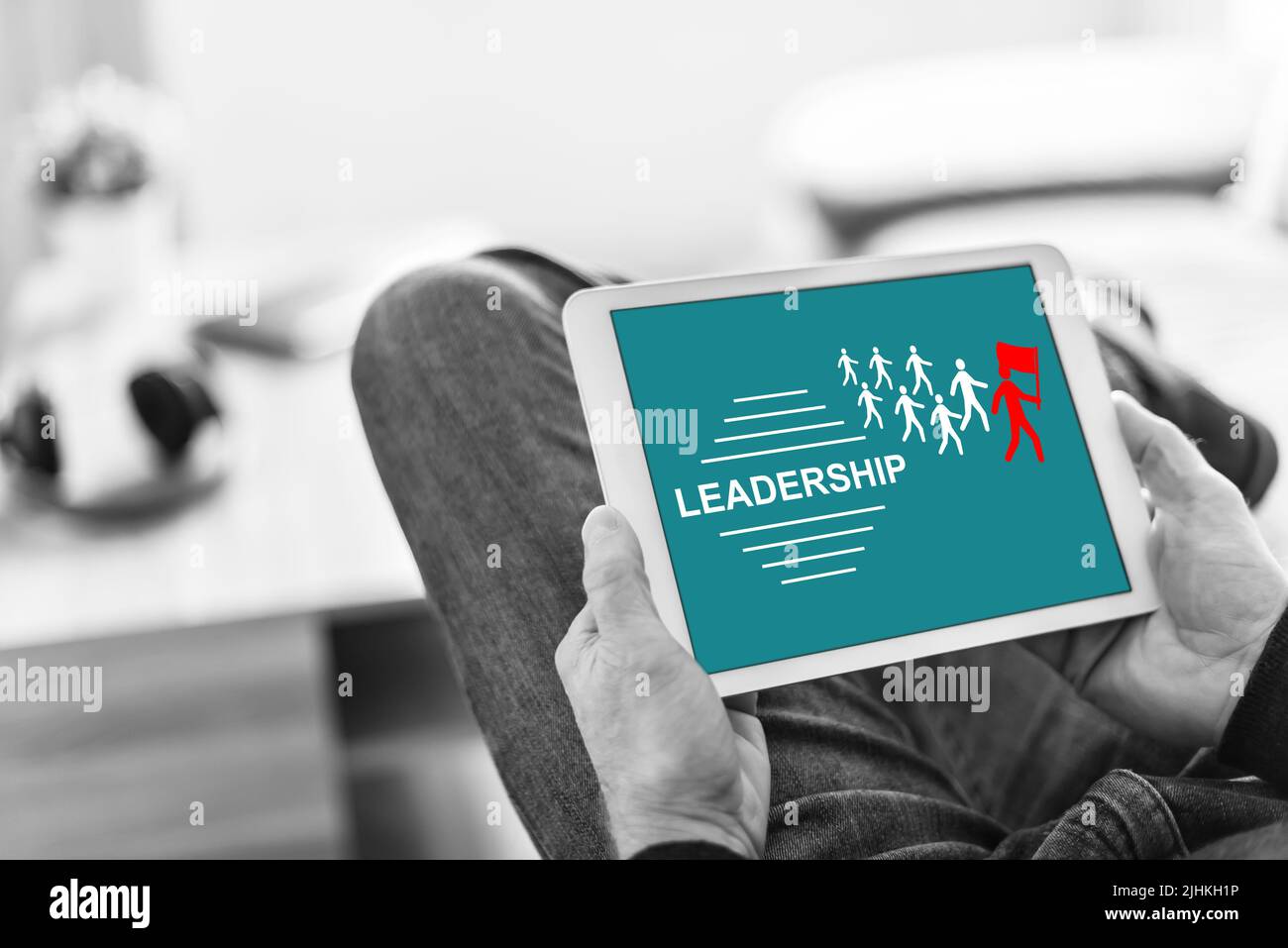 Tablet screen displaying a leadership concept Stock Photo - Alamy