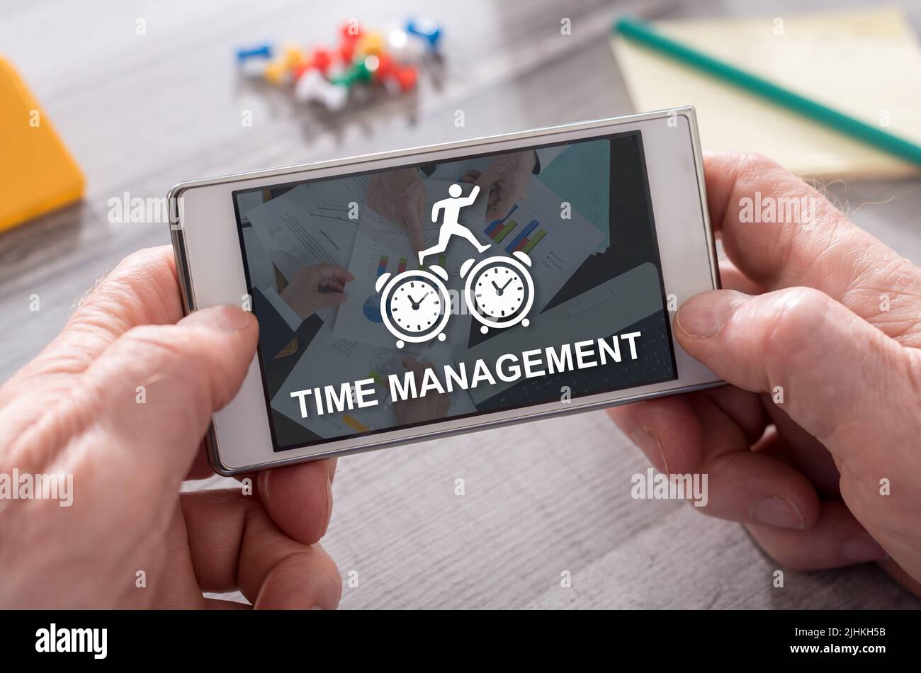 Time management concept on mobile phone Stock Photo - Alamy